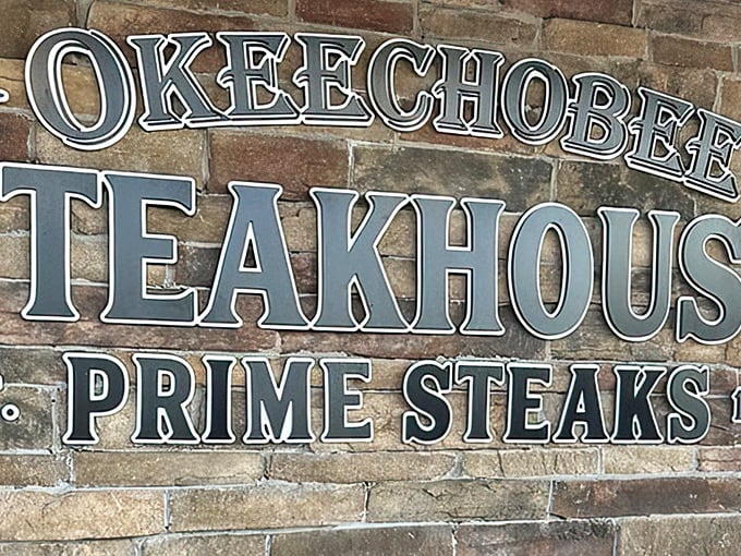 The unassuming stone facade of Okeechobee Steak House hides a carnivorous paradise within. Like finding out your quiet neighbor secretly knows how to tango professionally.