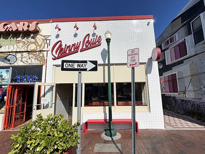 That iconic red script against white tile isn't just signage—it's a beacon calling all burger enthusiasts to their happy place.