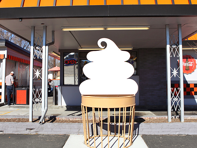 The iconic soft-serve sculpture stands guard outside Big Bun Drive In, a beacon of comfort food that's been calling to Boise's hungry masses for generations.
