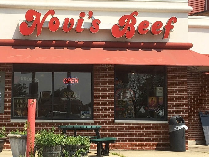 The iconic red script of Novi's Beef against brick and mortar – a beacon of hope for the hungry souls of Berwyn.