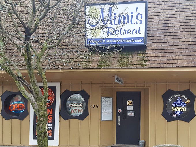 Mimi's Retreat welcomes you with its charming facade and iconic sign promising a place "where old & new friends come to meet." Small-town dining perfection awaits.