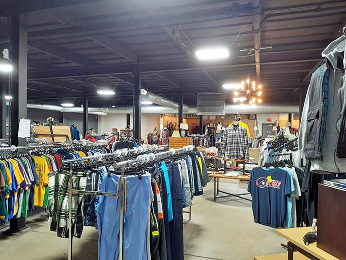 A rainbow of possibilities hangs on these racks—each shirt and pair of pants holding stories from past lives while awaiting new adventures with budget-conscious shoppers.