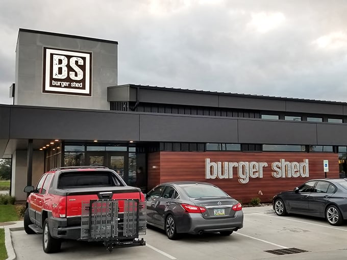 The sleek exterior of Burger Shed promises modern comforts, while that "BS" logo hints at the playful attitude waiting inside.