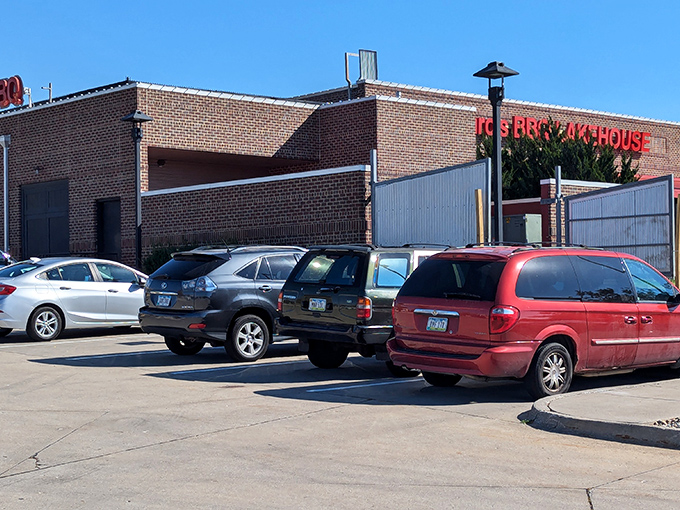 The unassuming brick exterior of Jethro's BBQ n' LakeHouse hides flavor explosions within—like finding a winning lottery ticket in your winter coat pocket.