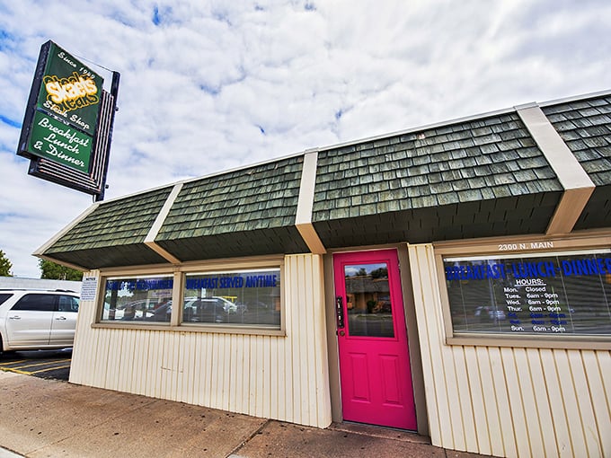 The modest exterior with its iconic red roof stands like a beacon in the night. No fancy frills, just the promise of honest-to-goodness Kansas cooking inside.
