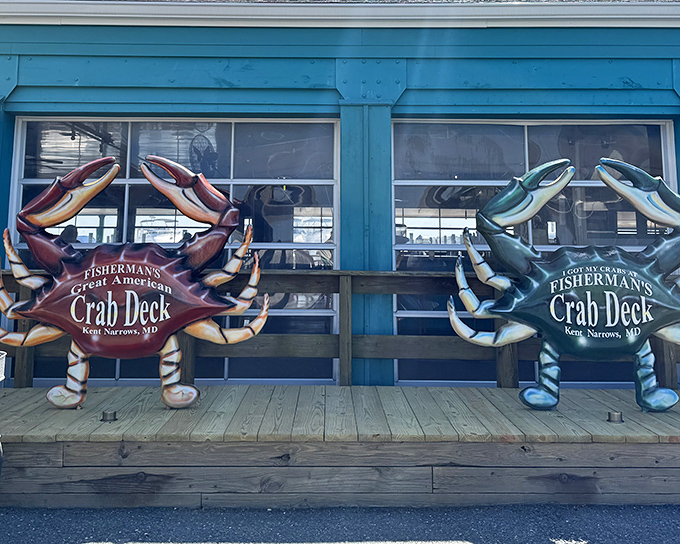 Those giant crab sculptures aren't just decoration—they're sentinels guarding the gateway to seafood paradise. Blue building, blue crabs, blue skies ahead.