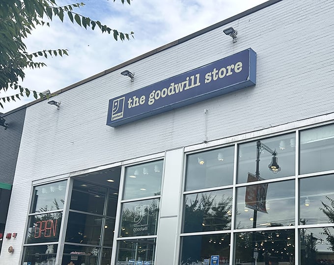 The clean white facade of Goodwill on Commonwealth Avenue stands like a beacon for bargain hunters—retail therapy without the "retail" prices.