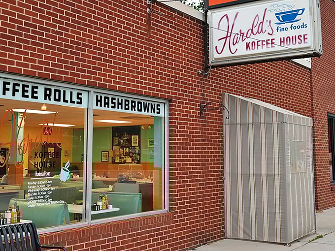 The iconic red brick exterior of Harold's Koffee House promises what every great American diner should—comfort food that hugs your soul from the inside.