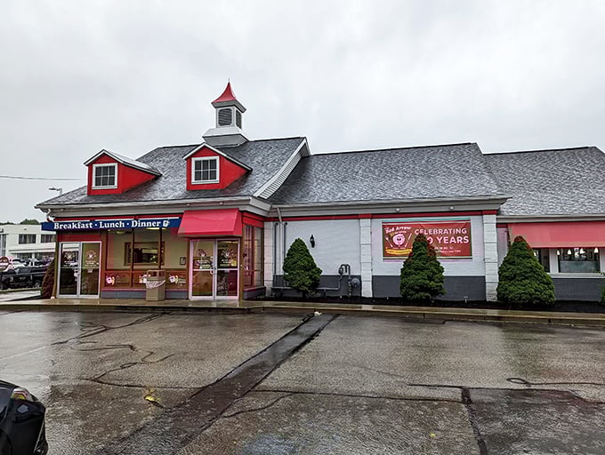 The iconic Red Arrow Diner in Nashua stands proud with its distinctive red exterior and charming cupola—a beacon of comfort food that's been satisfying hungry New Hampshirites for generations.