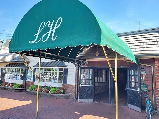 The iconic green awning with "LH" monogram welcomes seafood pilgrims like a maritime beacon of deliciousness to come.