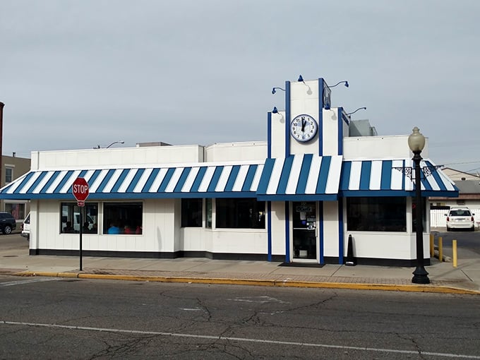 The iconic blue and white exterior of Carl's Townhouse stands like a time capsule in downtown Chillicothe, beckoning hungry travelers with its classic American diner charm.