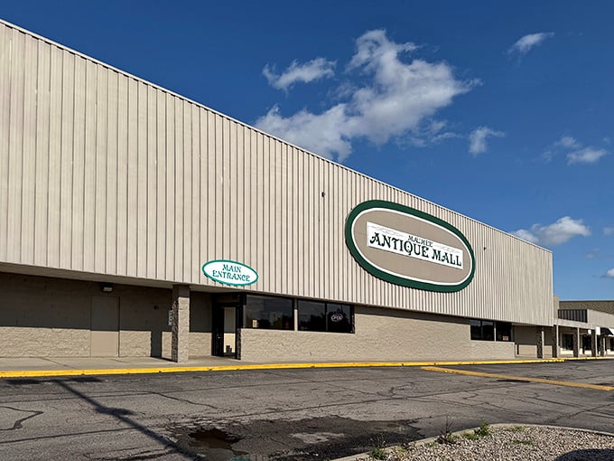 The unassuming exterior of Maumee Antique Mall – like finding a treasure chest disguised as a shoebox. History's waiting inside, no password required.