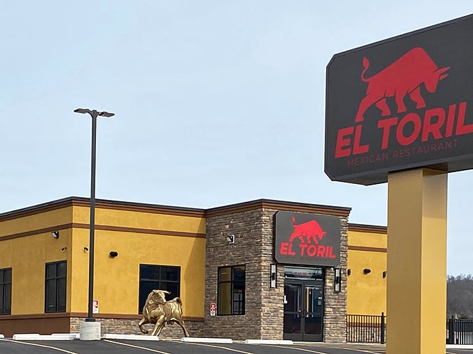 The golden exterior of El Toril stands proudly against the Ohio sky, its red bull logo promising authentic flavors that'll have you saying "olé!"
