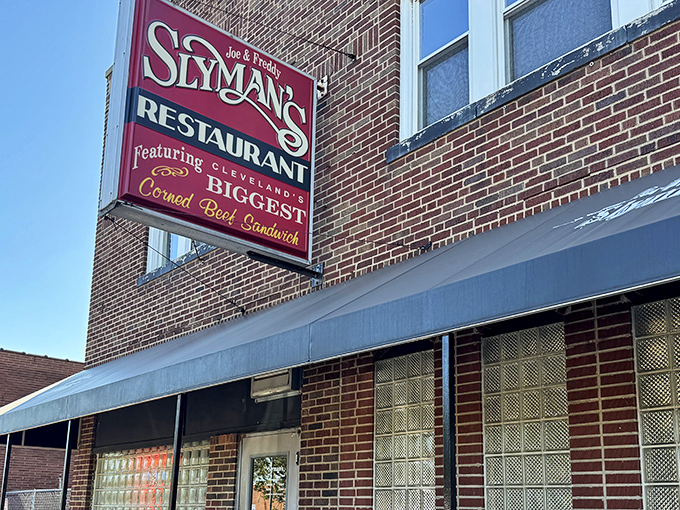 The iconic red sign promises "Cleveland's BIGGEST Corned Beef Sandwich" – a claim that isn't marketing hyperbole but delicious reality.