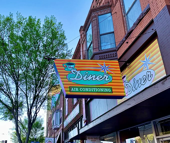 That iconic sign promises "AIR CONDITIONING" like it's 1955, but locals know it's really advertising something much more valuable—breakfast nirvana.