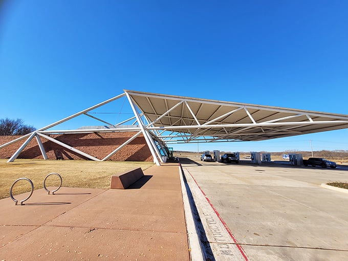 Step into the future of nostalgia with POPS' dramatic entrance, where angular steel and glass welcome hungry travelers with a promise of Route 66 reimagined.