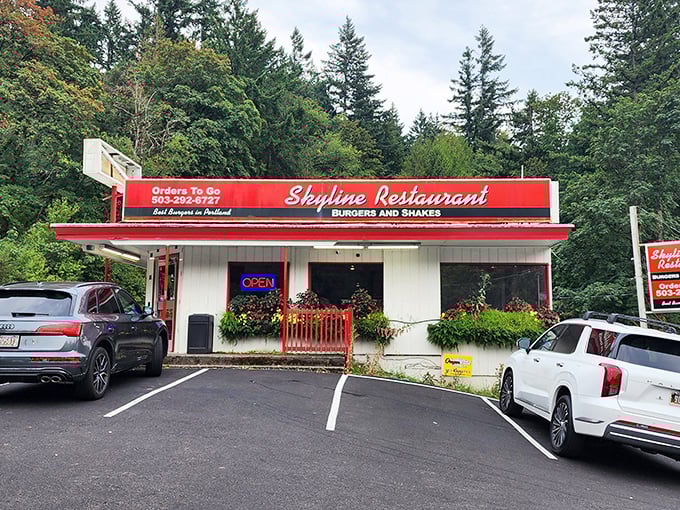 Nestled among towering Douglas firs, Skyline Restaurant's classic red-and-white facade promises burger bliss just moments from Portland's urban hustle.