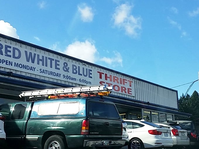 The unassuming exterior of Red White & Blue Thrift Store in Gladstone hides a universe of treasures waiting to be discovered inside.