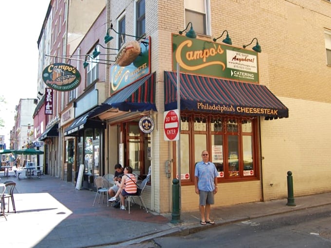 Campo's iconic blue awning and vintage sign stand as a beacon for cheesesteak pilgrims in Old City Philadelphia, promising authentic flavors just steps from Independence Hall.