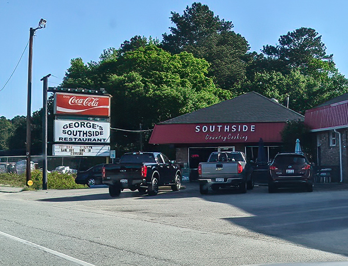 The iconic red awning and Coca-Cola sign welcome hungry travelers like a Southern grandmother ready with a warm hug and hot breakfast.
