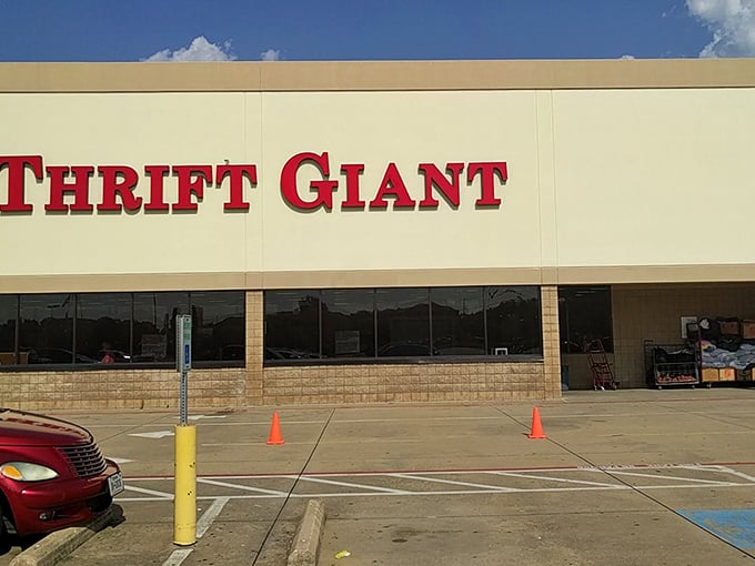 That bold red lettering against the pale exterior isn't just a sign—it's a siren call to bargain hunters everywhere.