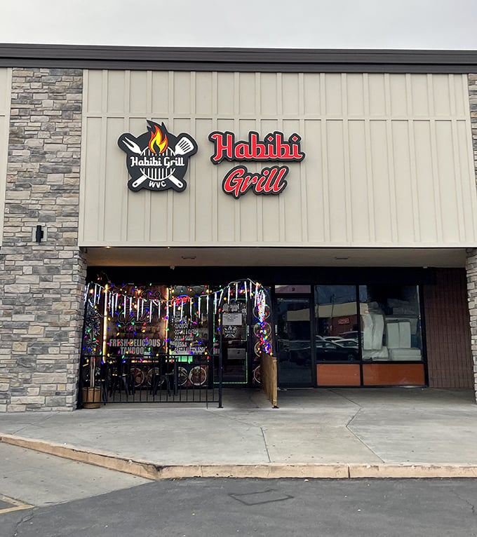 The storefront might be modest, but that flame logo isn't lying—what happens inside is pure fire.