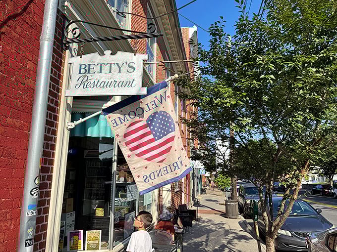 That welcoming awning and patriotic flag announce you've found Shepherdstown's breakfast headquarters—where early risers become believers.