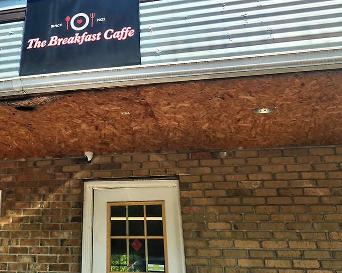 The unassuming brick exterior of The Breakfast Caffe proves once again that culinary treasures often hide in plain sight.