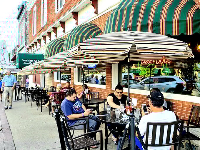 Those classic striped awnings aren’t just for show—they’re like a beacon calling hungry travelers home to Lake Geneva’s beloved sidewalk scene.