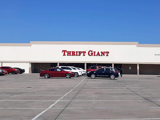 That bold red lettering against the pale exterior isn't just a sign—it's a siren call to bargain hunters everywhere.