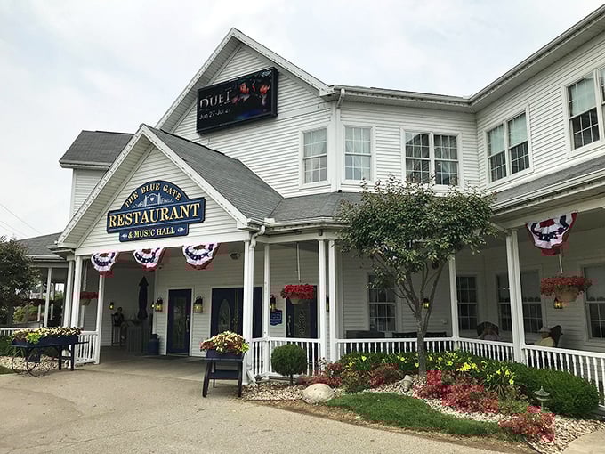 The white clapboard exterior of Blue Gate welcomes visitors like a warm hug from your favorite aunt who always has cookies waiting.