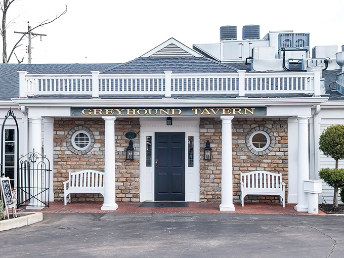 The stately stone facade of Greyhound Tavern welcomes you like an old Kentucky friend, complete with white rocking chairs that practically beg you to sit a spell. 