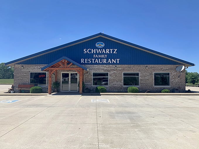 With its bright blue roof gleaming against Indiana’s sky, Schwartz Family Restaurant stands as a comfort food sanctuary for road-weary travelers.