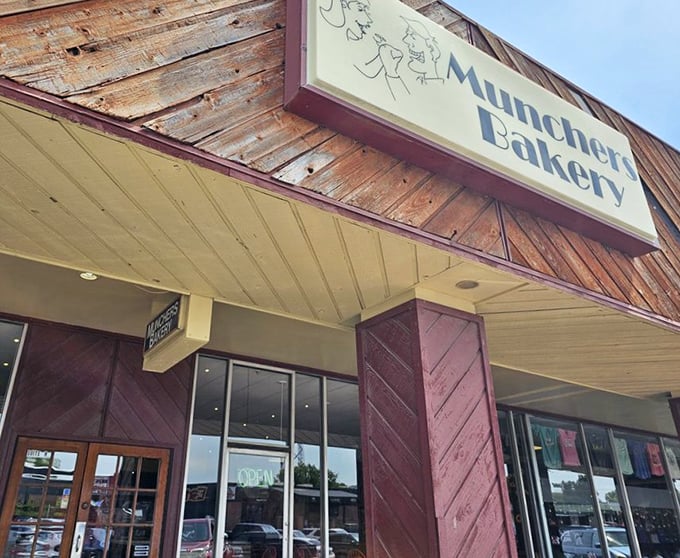 The warm wooden exterior and inviting signage promise fresh-baked happiness waiting just beyond those doors.