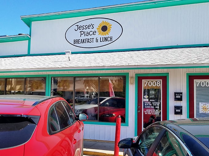 Jesse's Place announces itself with cheerful turquoise trim and a sunflower logo—like Florida sunshine distilled into a breakfast spot that promises zero pretension and maximum flavor.