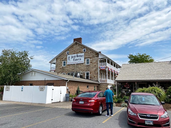 A perfect Pennsylvania sky frames this colonial gem, where modern cars park outside a tavern that's been welcoming travelers since horse-drawn carriages ruled the road.