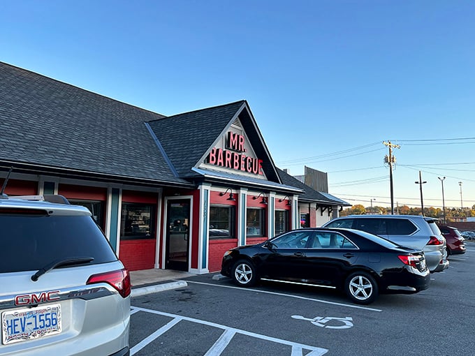The red-trimmed exterior of Mr. Barbecue stands like a beacon of hope for hungry travelers – a temple of smoke where barbecue dreams come true.