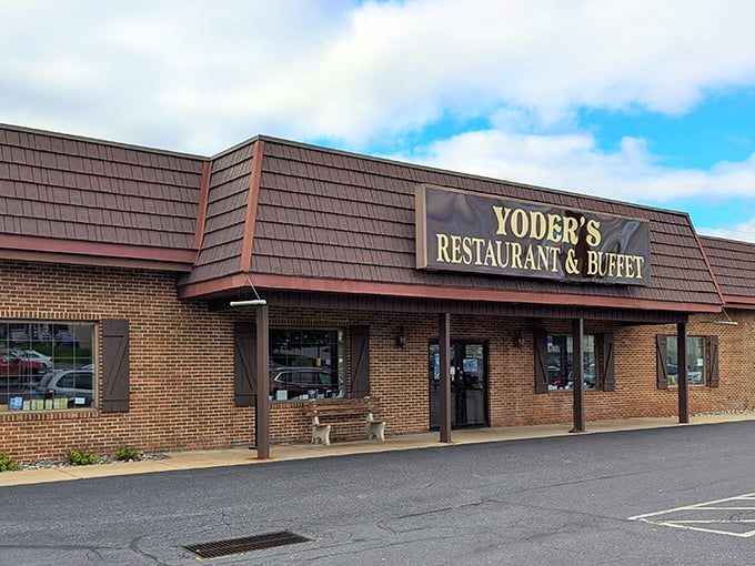 Another angle of Yoder's brick façade and welcoming entrance, where the bench outside isn't just decoration—it's strategic seating for the post-buffet recovery period.