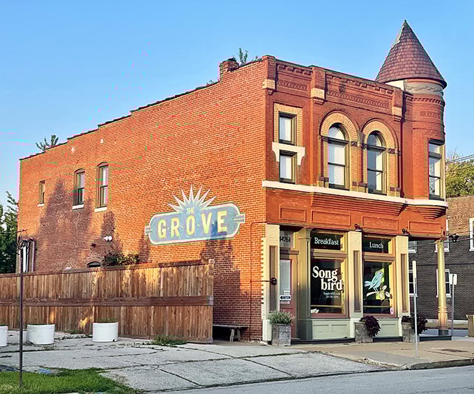 Songbird's historic brick building in The Grove stands like a culinary sentinel, promising delicious treasures within its charming corner location.