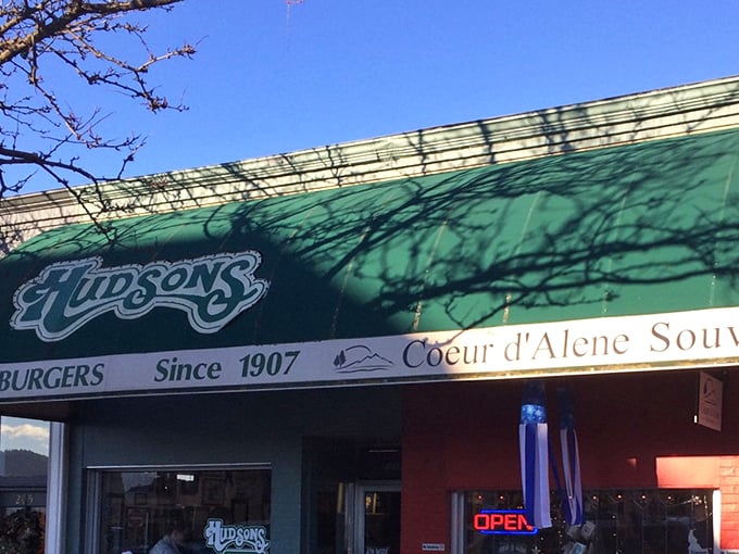 The iconic green awning of Hudson's has been beckoning burger lovers to downtown Coeur d'Alene since 1907. Some traditions just don't need updating.