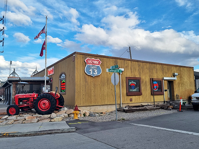 The unassuming wooden exterior of Lucky 13 stands like a burger speakeasy, complete with vintage tractor sentinel. Who knew paradise had a zip code?