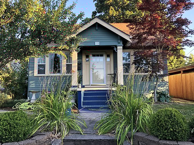 The unassuming blue bungalow that houses culinary greatness. Like finding Shakespeare writing in a garden shed—unexpected but magical.