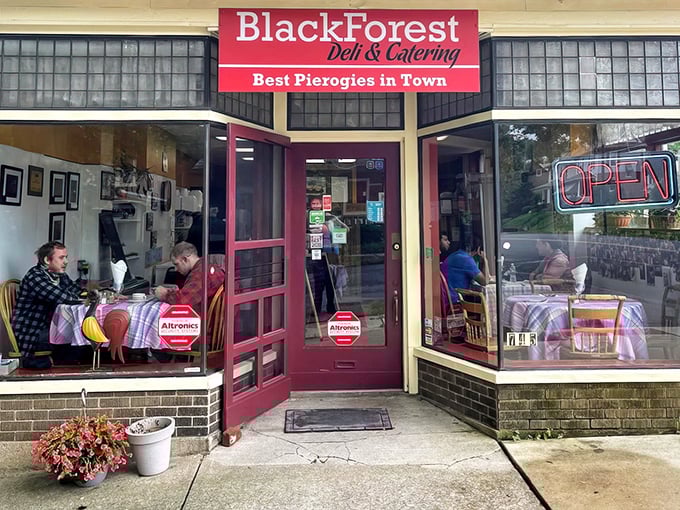 The unassuming storefront of Black Forest Deli promises culinary treasures within. That red sign isn't kidding about those pierogies – they're the real deal!