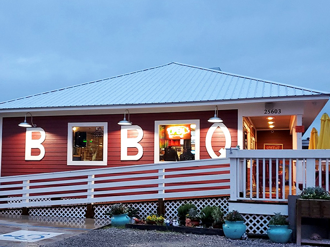 As evening approaches, Moe's warm glow spills onto the deck – a beacon of barbecue hope for hungry travelers seeking smoky salvation.