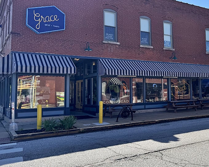 Brick exterior, striped awnings, and promises of cornbread – the trifecta of Southern comfort hiding in plain sight on this St. Louis street corner.