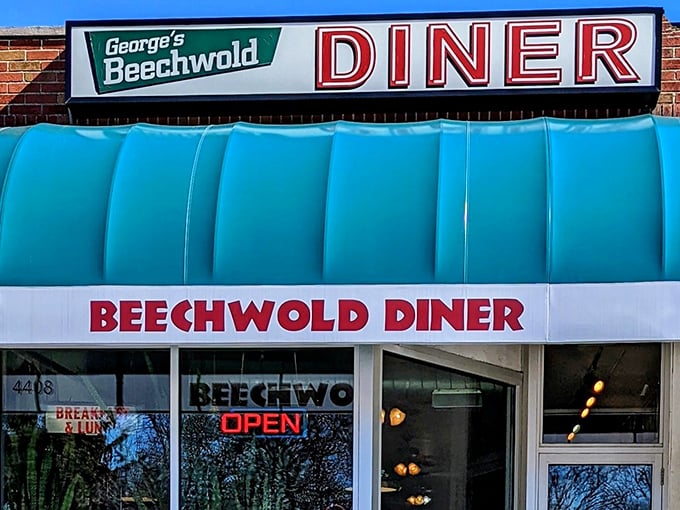 That turquoise awning isn't just eye-catching—it's a beacon of hope for hungry souls seeking authentic diner magic in Columbus.