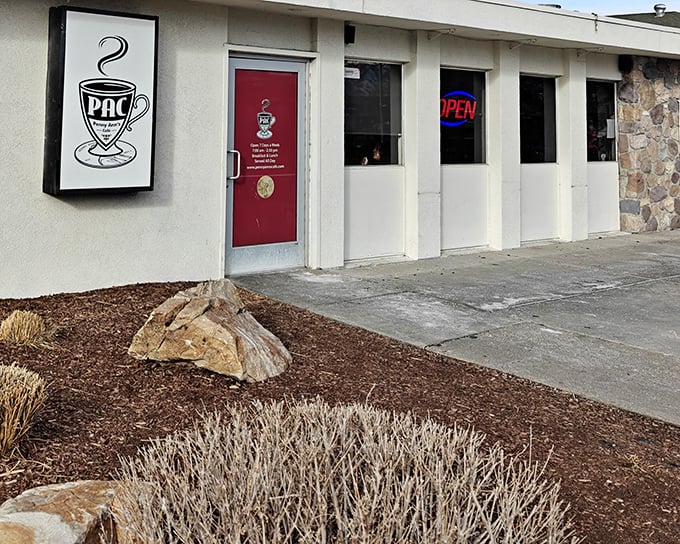 The unassuming exterior hides culinary treasures within. Like finding a secret breakfast society behind that cheerful red door.