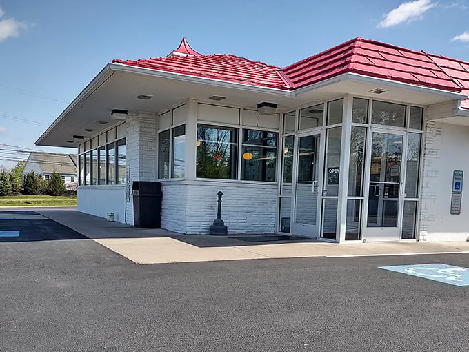The classic mid-century architecture of Speck's, with its distinctive red roof and white brick exterior, promises a nostalgic dining experience that delivers on flavor.