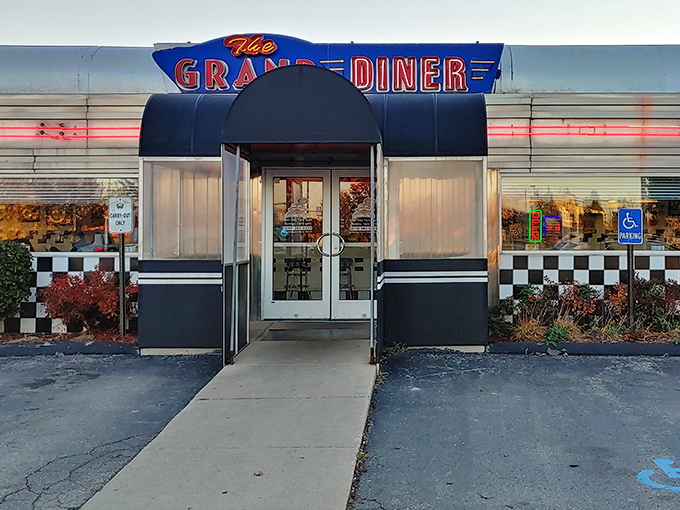 That neon sign isn't just announcing a restaurant—it's promising a time machine. The classic black and white checkerboard pattern practically screams "comfort food ahead!"