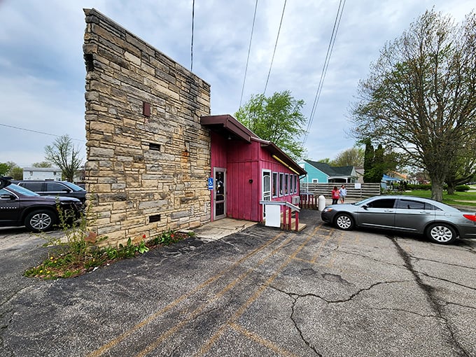 The stone facade and bright pink exterior of Porky's isn't trying to impress Instagram—it's too busy perfecting patty melts that will haunt your dreams.
